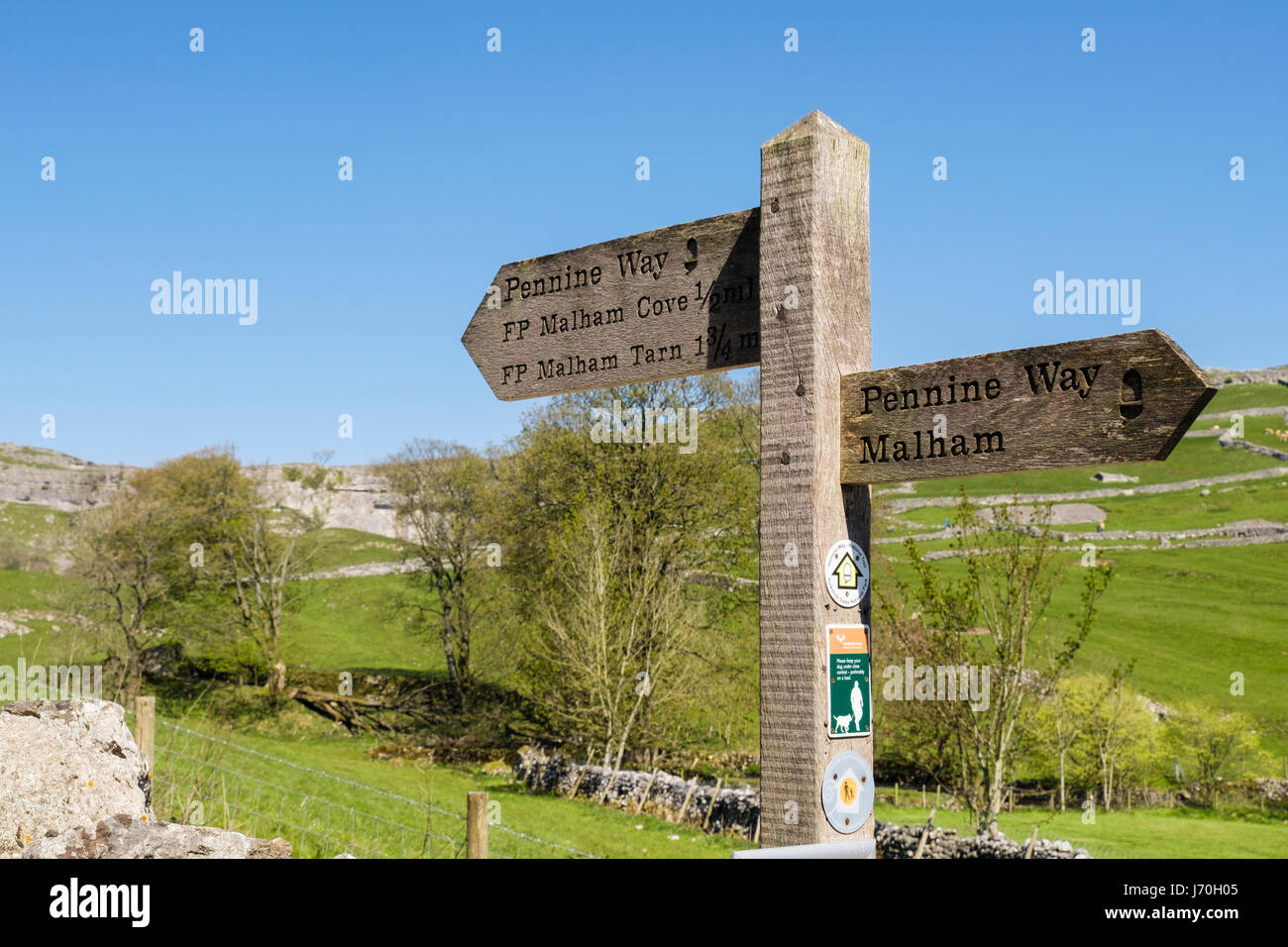 Pennine Way sign signpost on footpath to Malham Cove. Malham ...