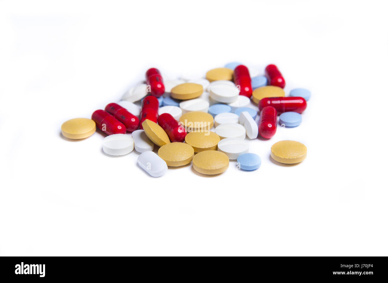 Medical concept colored pills Cut Out Stock Images & Pictures - Alamy