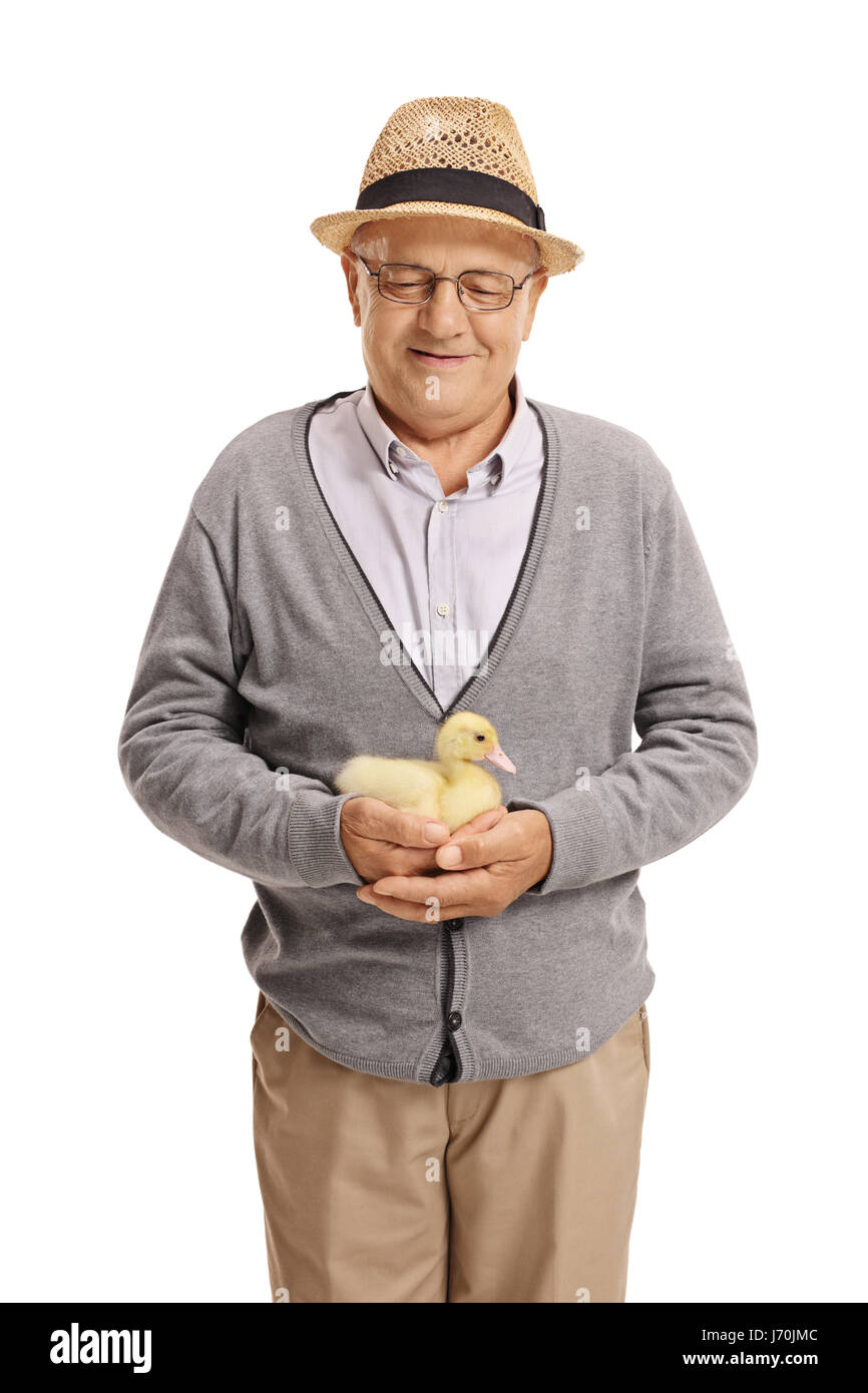 Elderly man holding a duckling isolated on white background Stock Photo ...