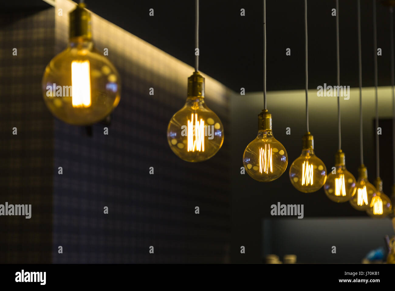 Modern Design Light Bulbs in Row inside Shop Stock Photo - Alamy