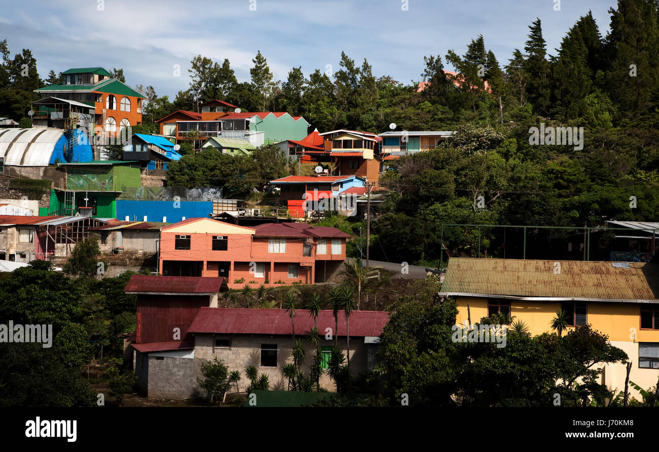 hill cloud cloudy destination country lawn green forest house building city Stock Photo - Alamy