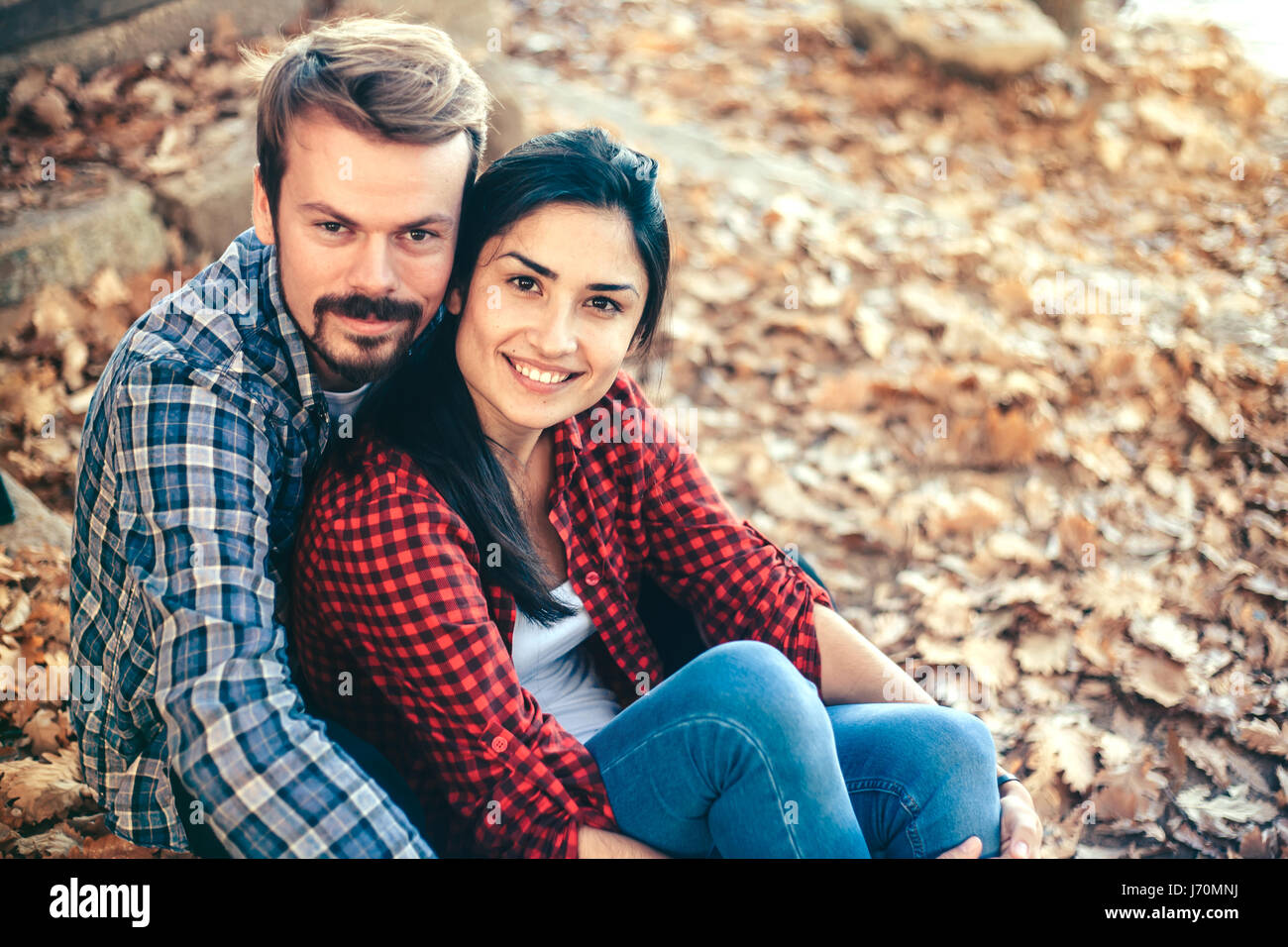 Loving couple smiling Stock Photo - Alamy