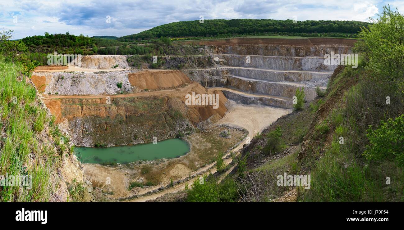 Quarry, limestone, lake, forest, sky Stock Photo - Alamy