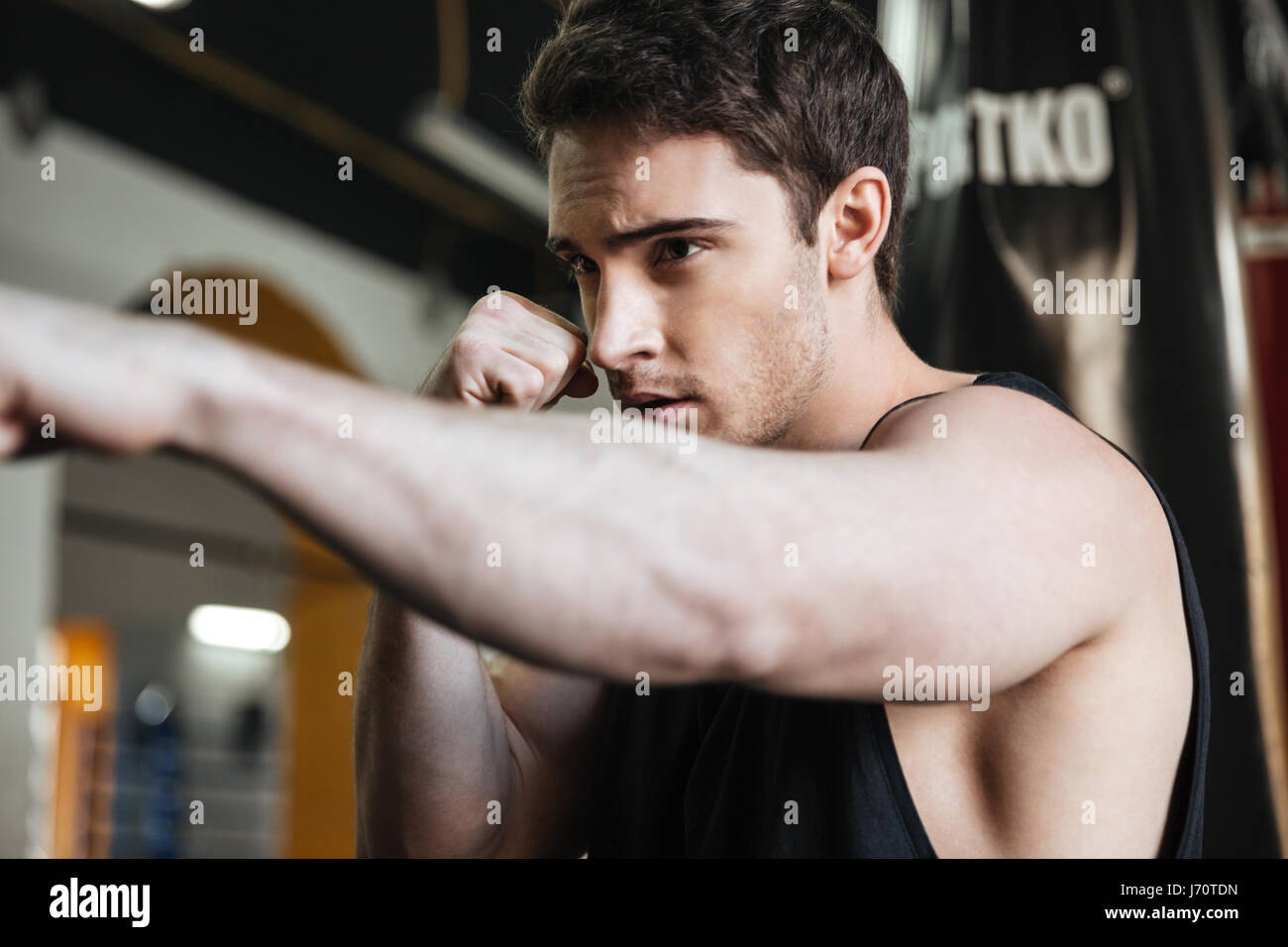 Boxer in punching pose hi-res stock photography and images - Alamy
