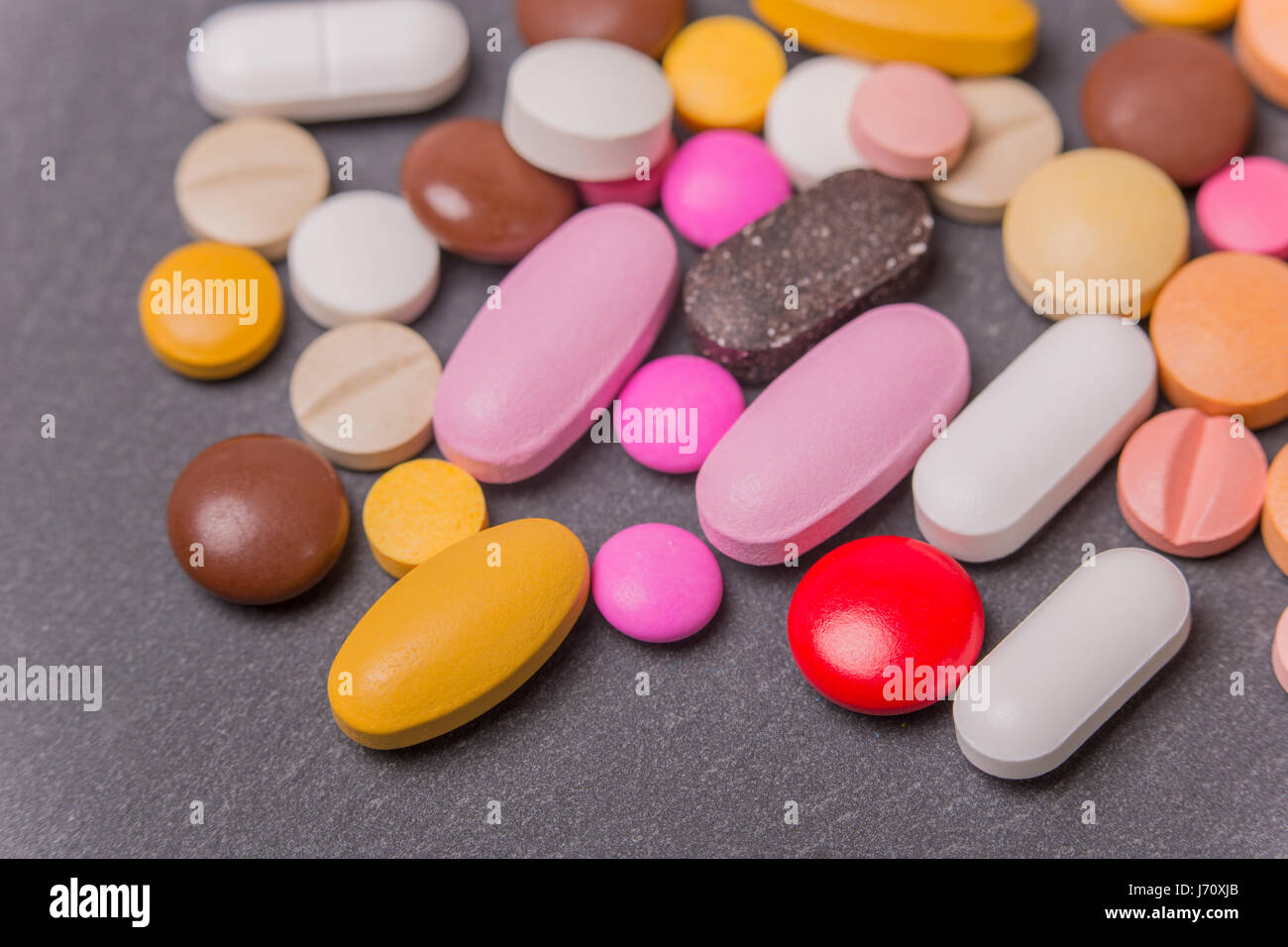 different Tablets pills capsule heap mix therapy drugs Stock Photo - Alamy