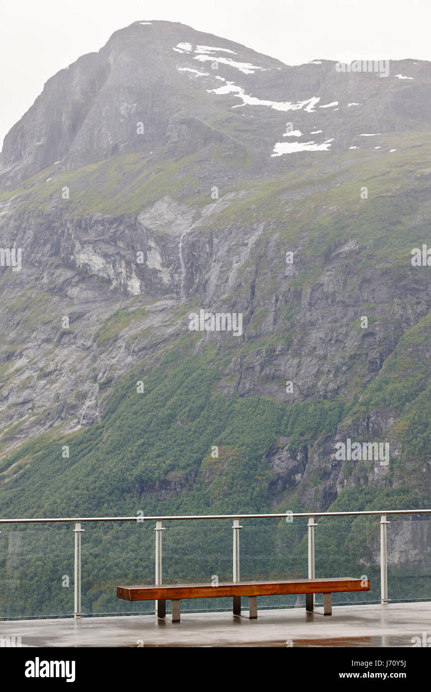 Norwegian mountain viewpoint with bench. Travel Norway. Vertical Stock ...
