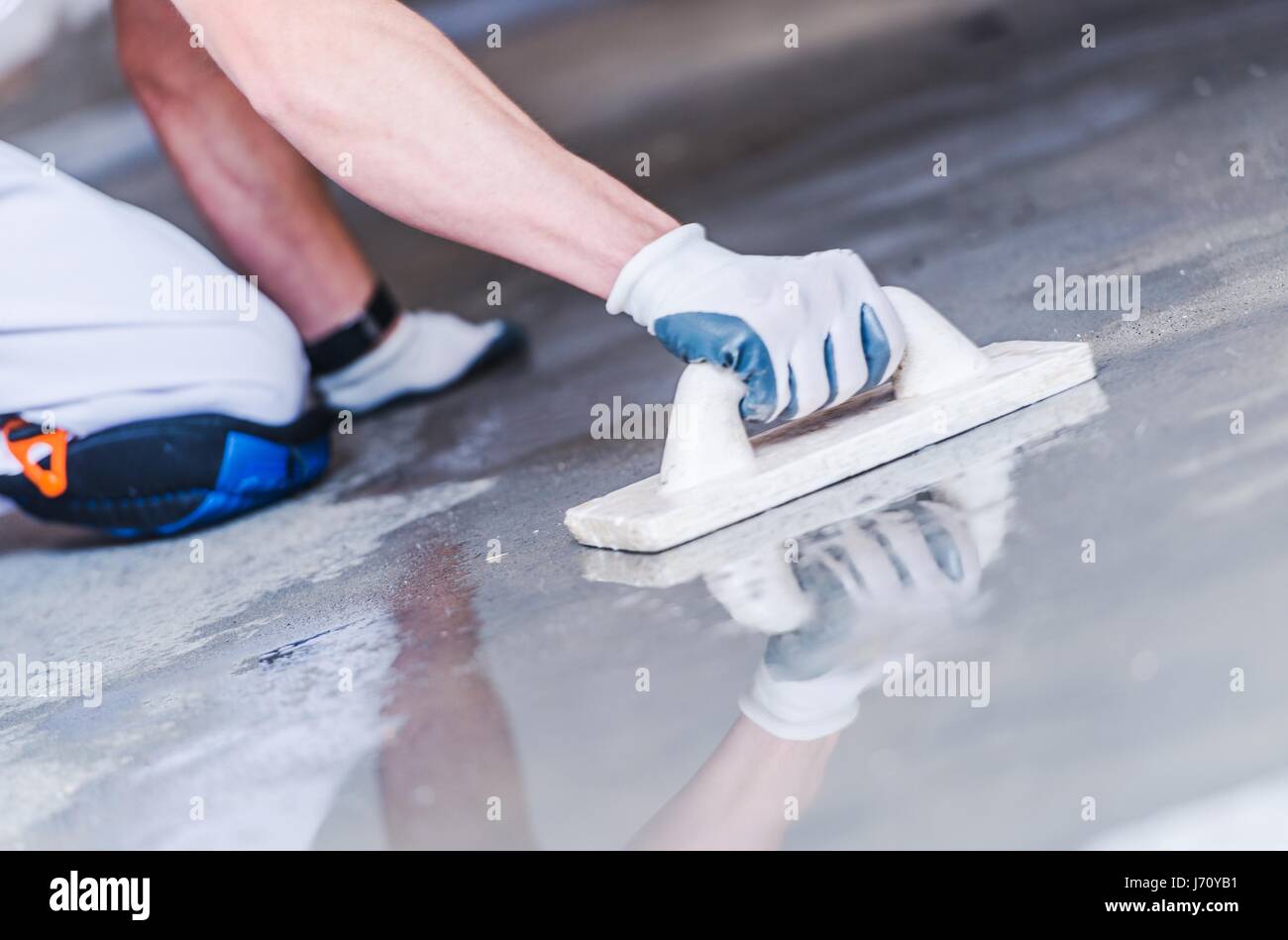 Concrete Floor Building. Watering and Leveling Floor Surface. House ...