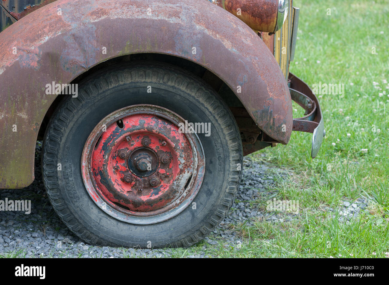 Old tire in a rusty car Stock Photo - Alamy