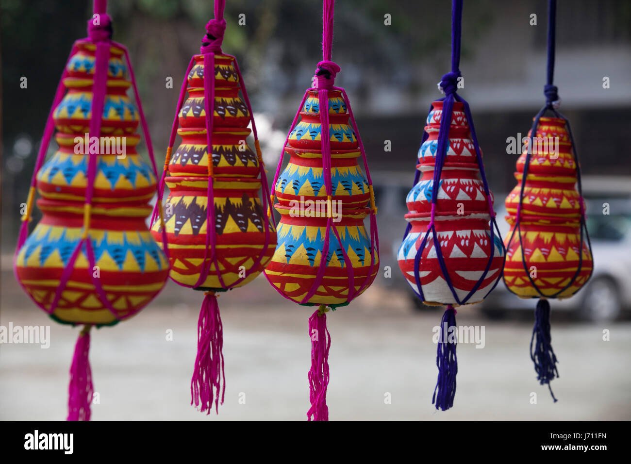 Colourful clay pots locally called Shokher Hari display at ‘Karu Mela ...