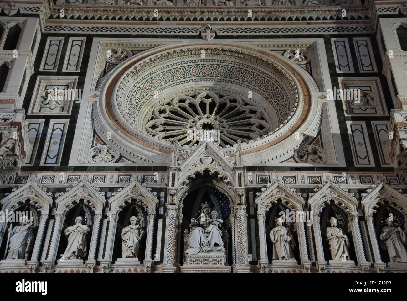 church statue window porthole dormer window pane cathedral sculpture ...