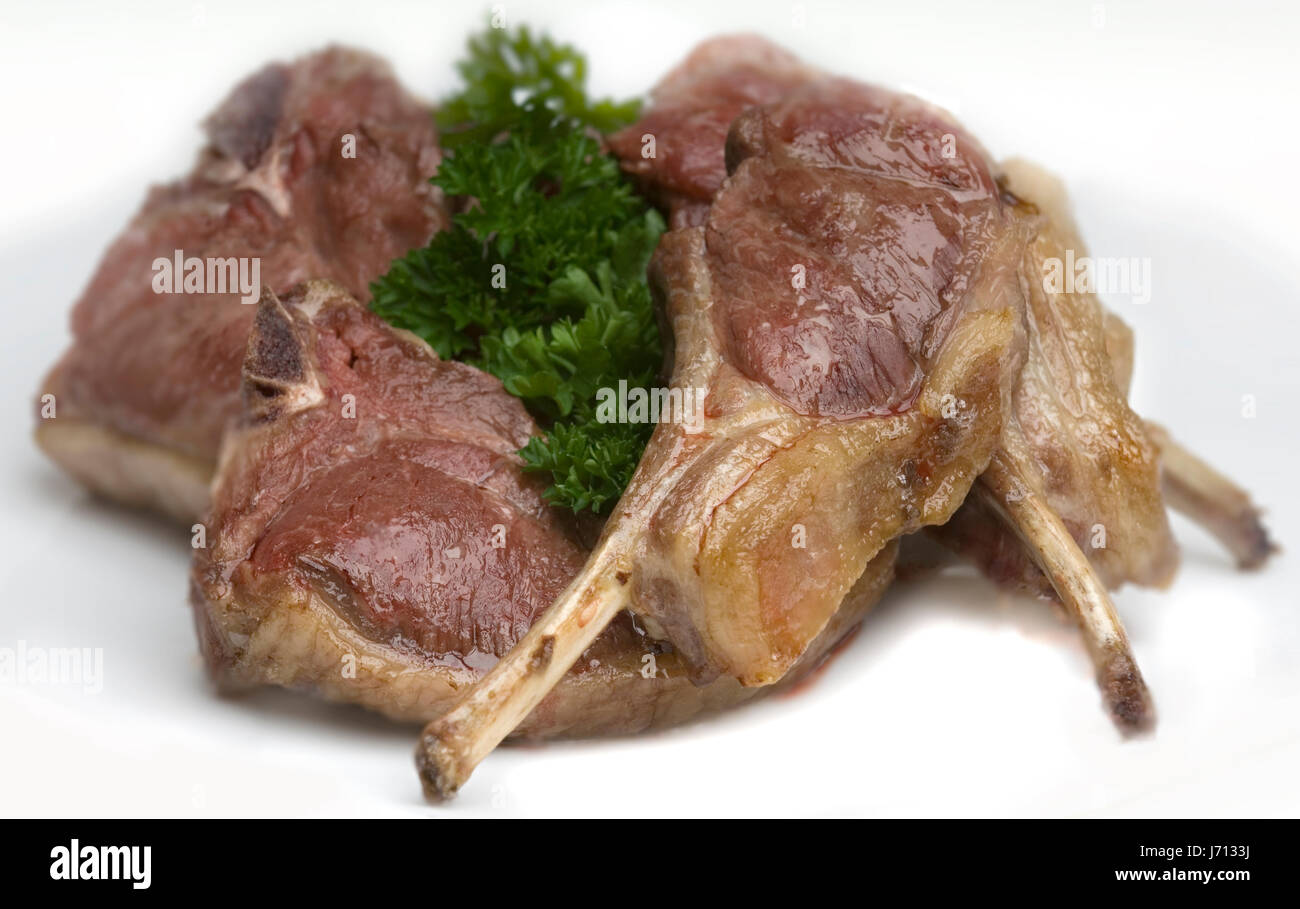 Lamb Chops on white plate Stock Photo - Alamy