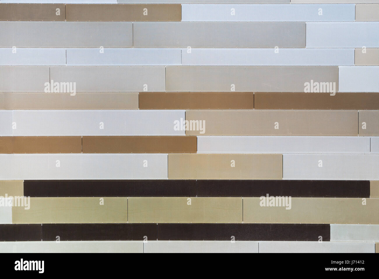 Abstract background from metal stripes of different color and size ...