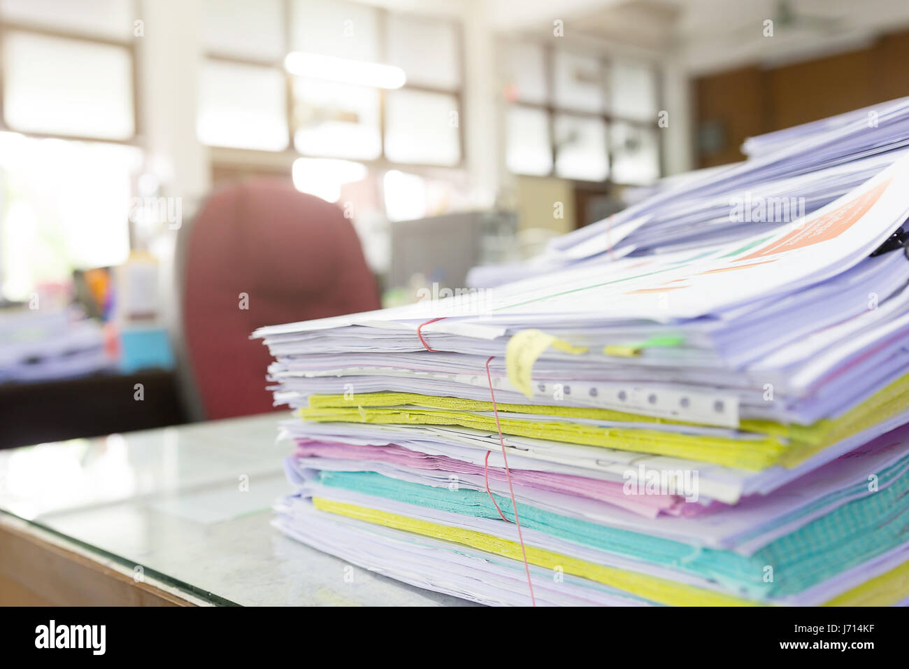 Pile of unfinished documents on office desk, Stack of business paper ...