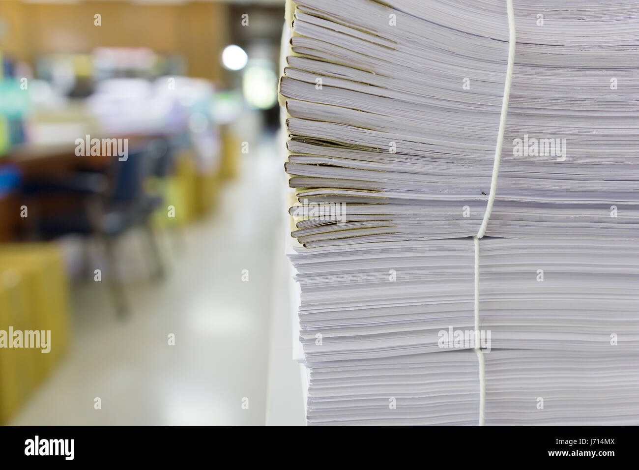 Pile of unfinished documents on office desk, Stack of business paper ...