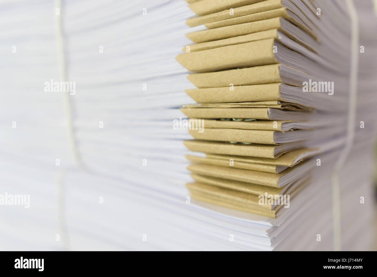 Pile of unfinished documents on office desk, Stack of business paper ...