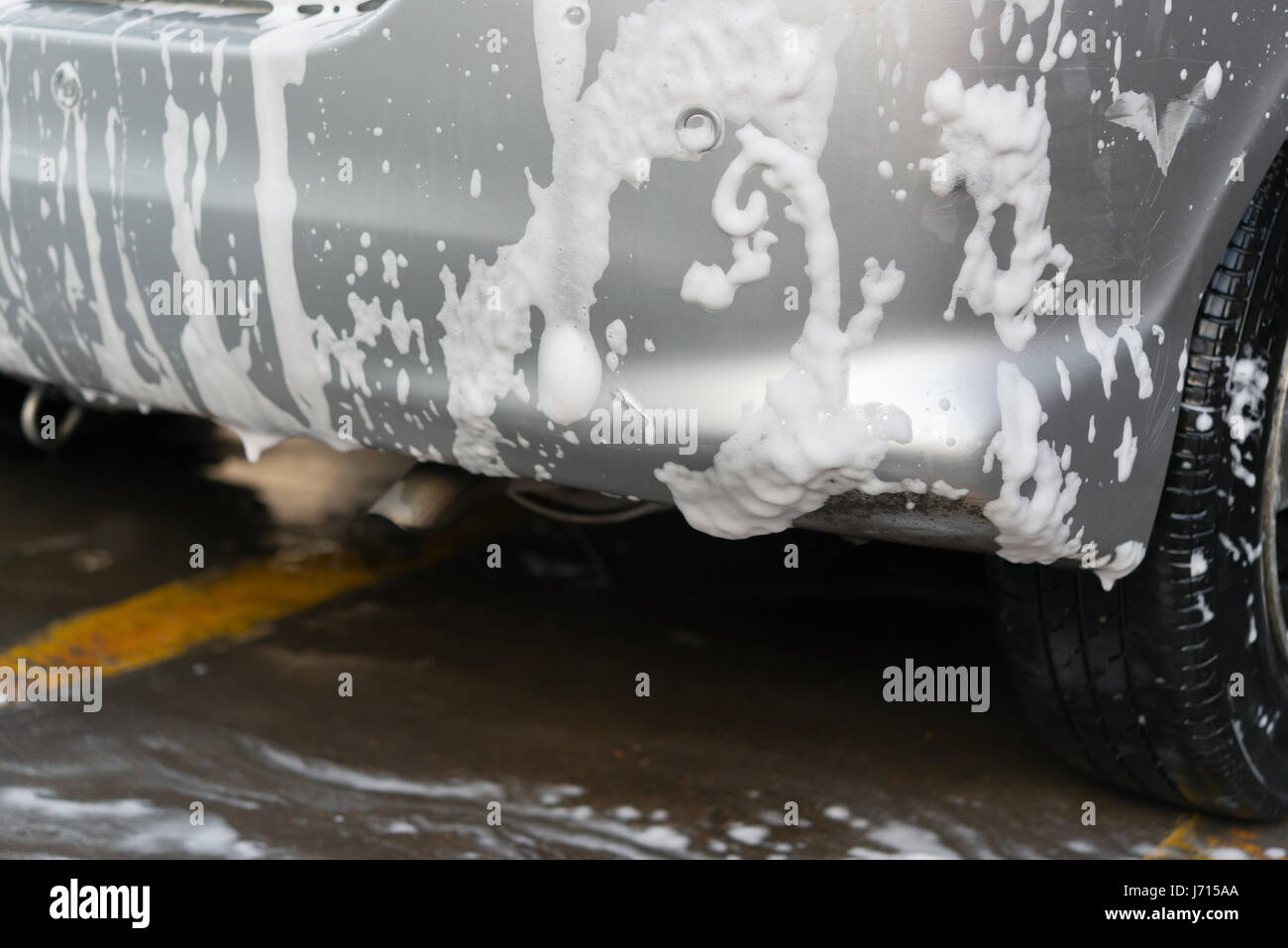 washing a car with soapy water Stock Photo - Alamy