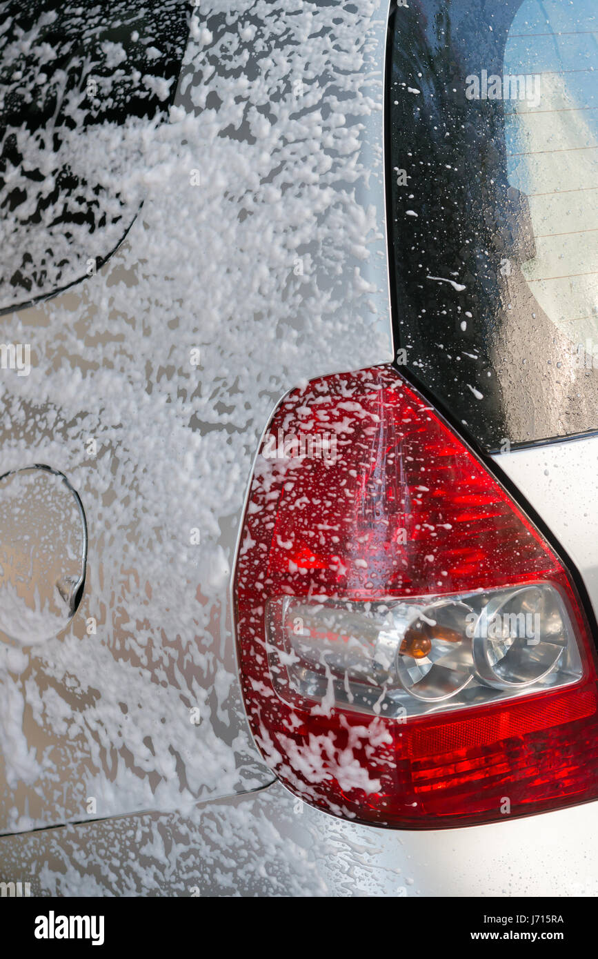 washing a car with soapy water Stock Photo - Alamy