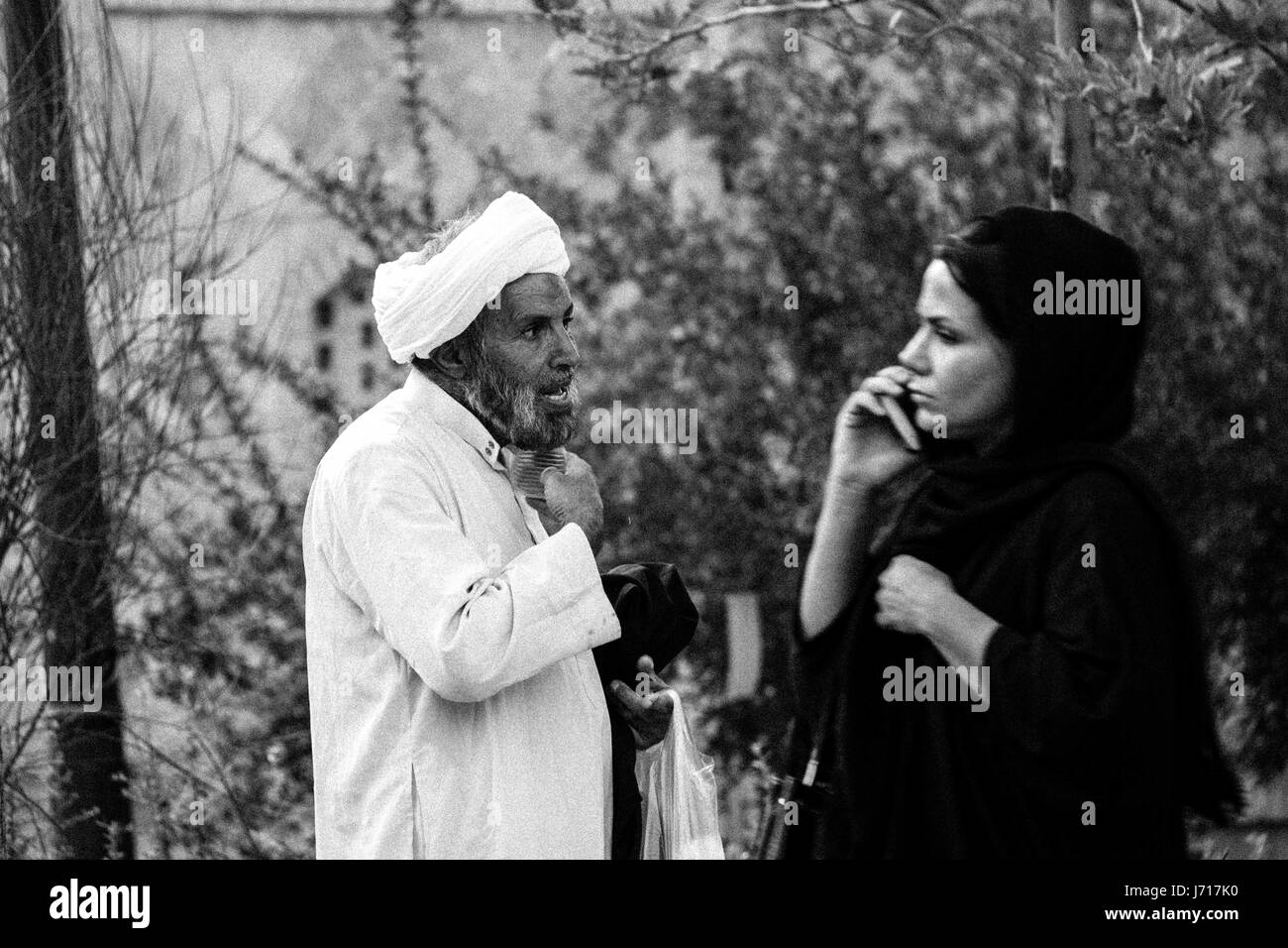 Mollah and woman having a call, Tehran, Iran Stock Photo - Alamy
