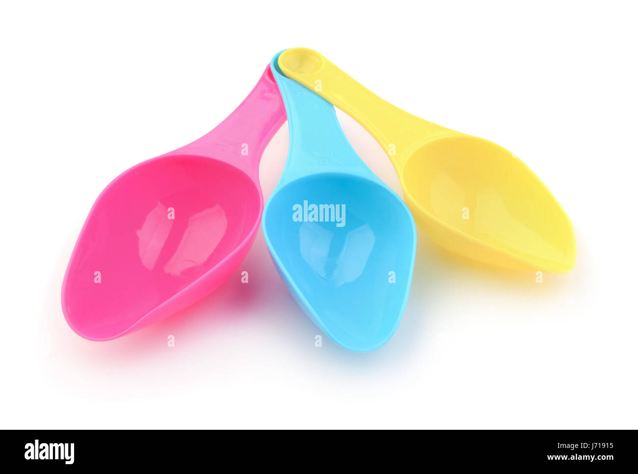 Set of colorful measuring spoons isolated on white Stock Photo - Alamy