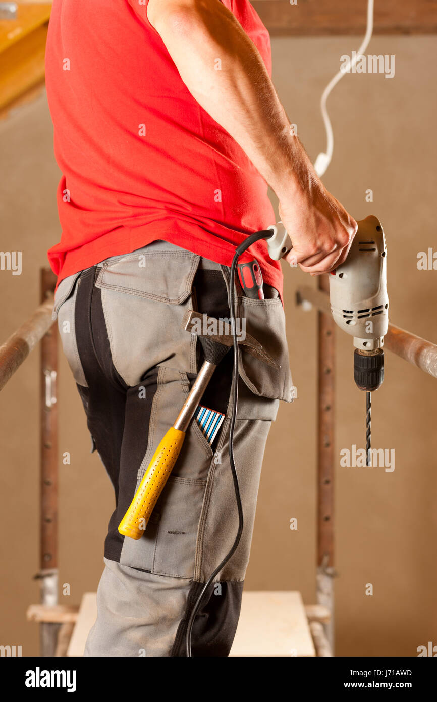worker with drill Stock Photo - Alamy