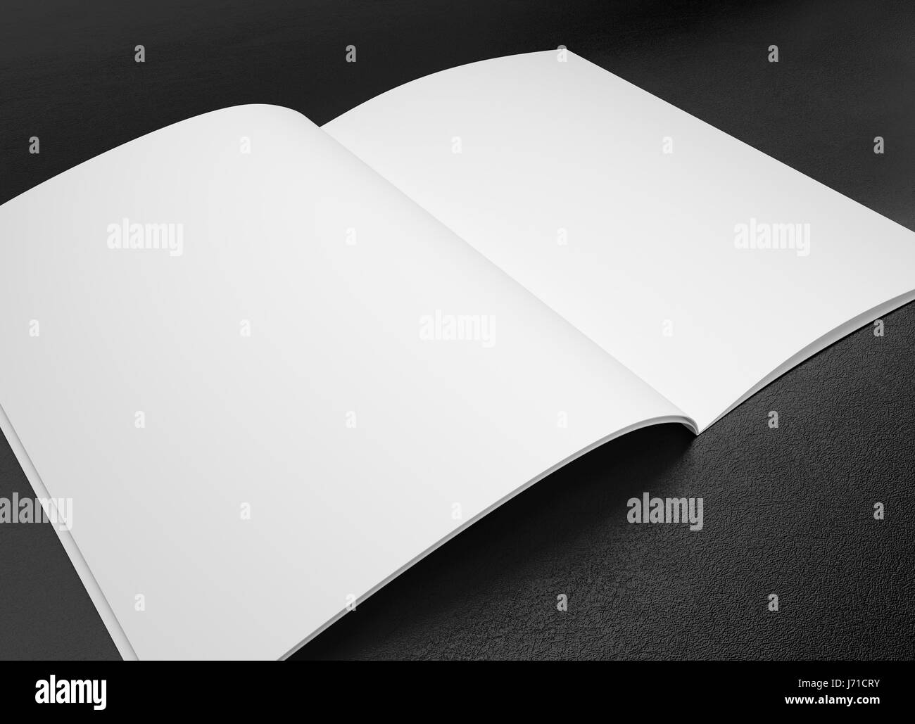 Open book on black background Stock Photo - Alamy