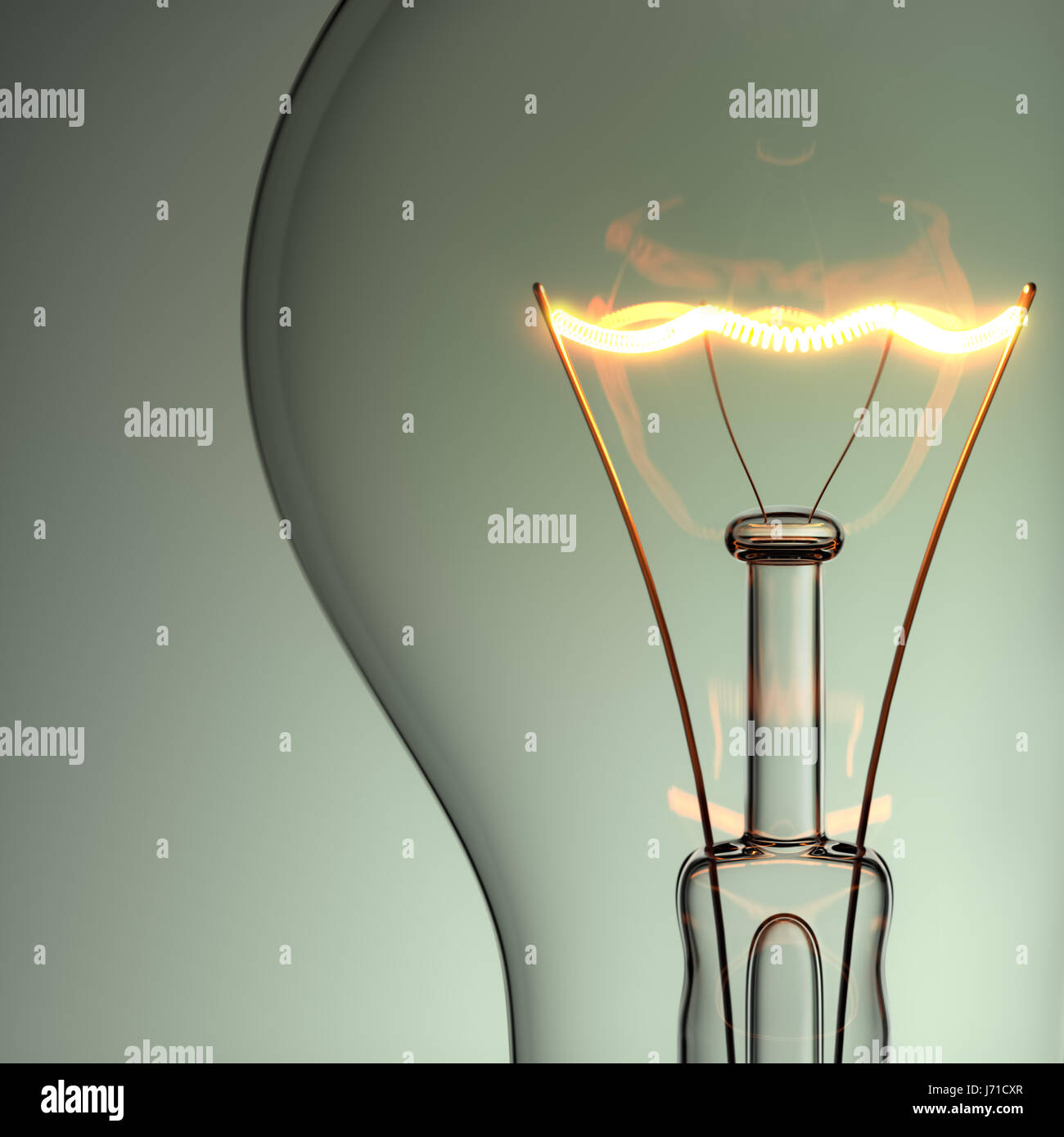 Light bulb with glow on studio background Stock Photo - Alamy