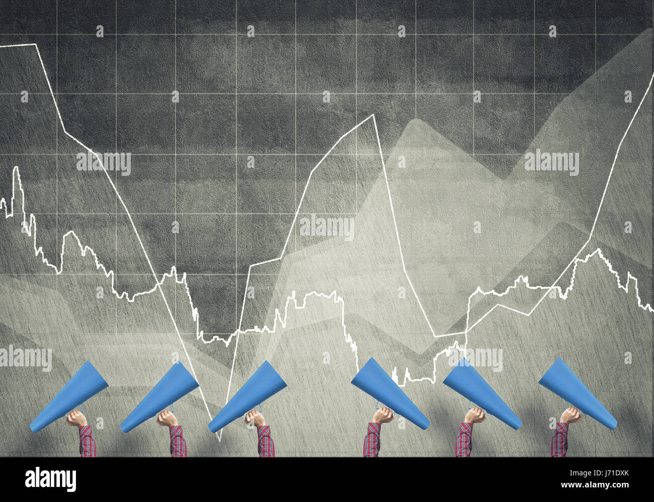 female hands in a row holding blue paper trumpets against graphs ...