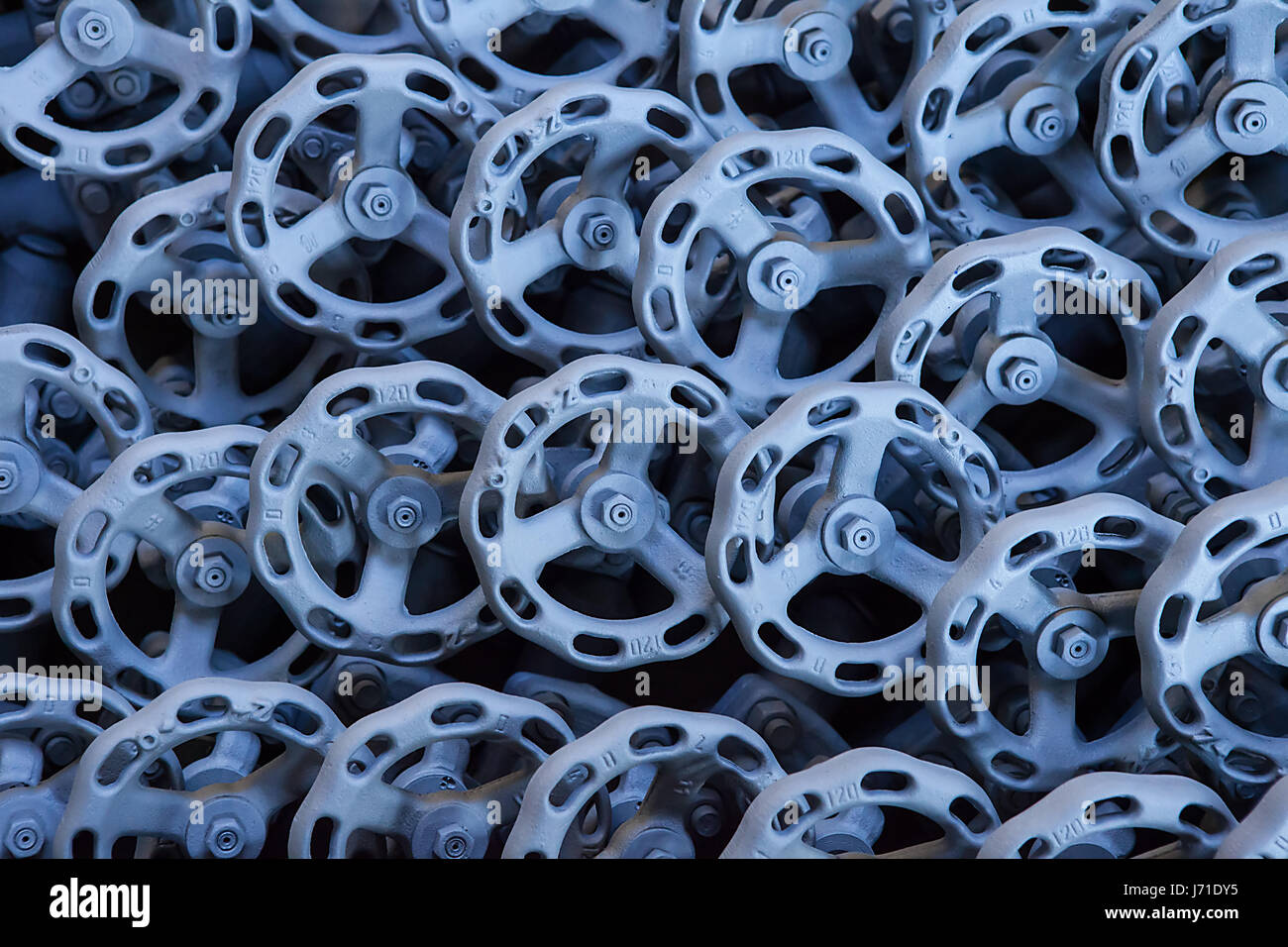 Background from hand wheel of industrial valves ready for dispatch on ...