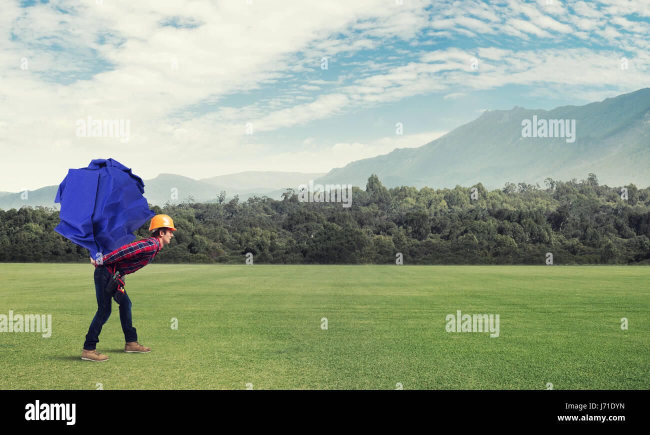 Engineer man carry load Stock Photo - Alamy