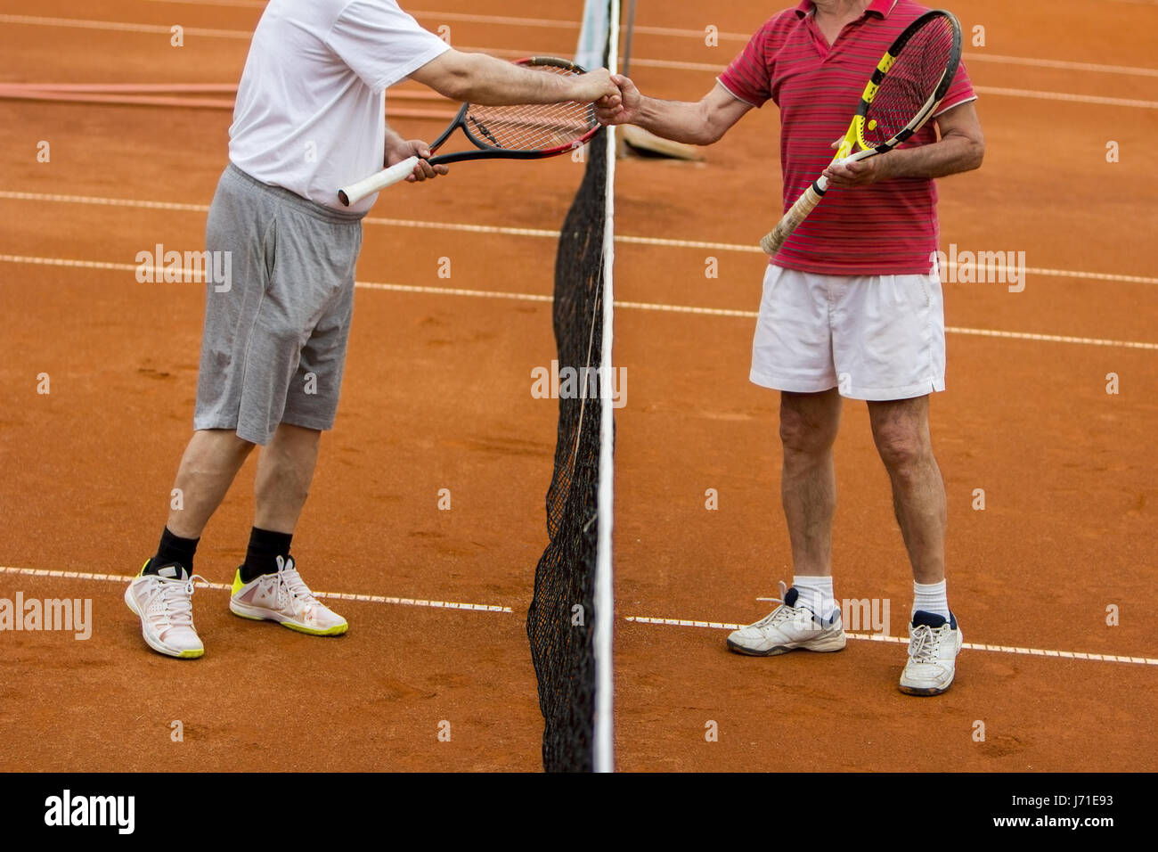 Tennis players shake hands after the tennis match Stock Photo - Alamy