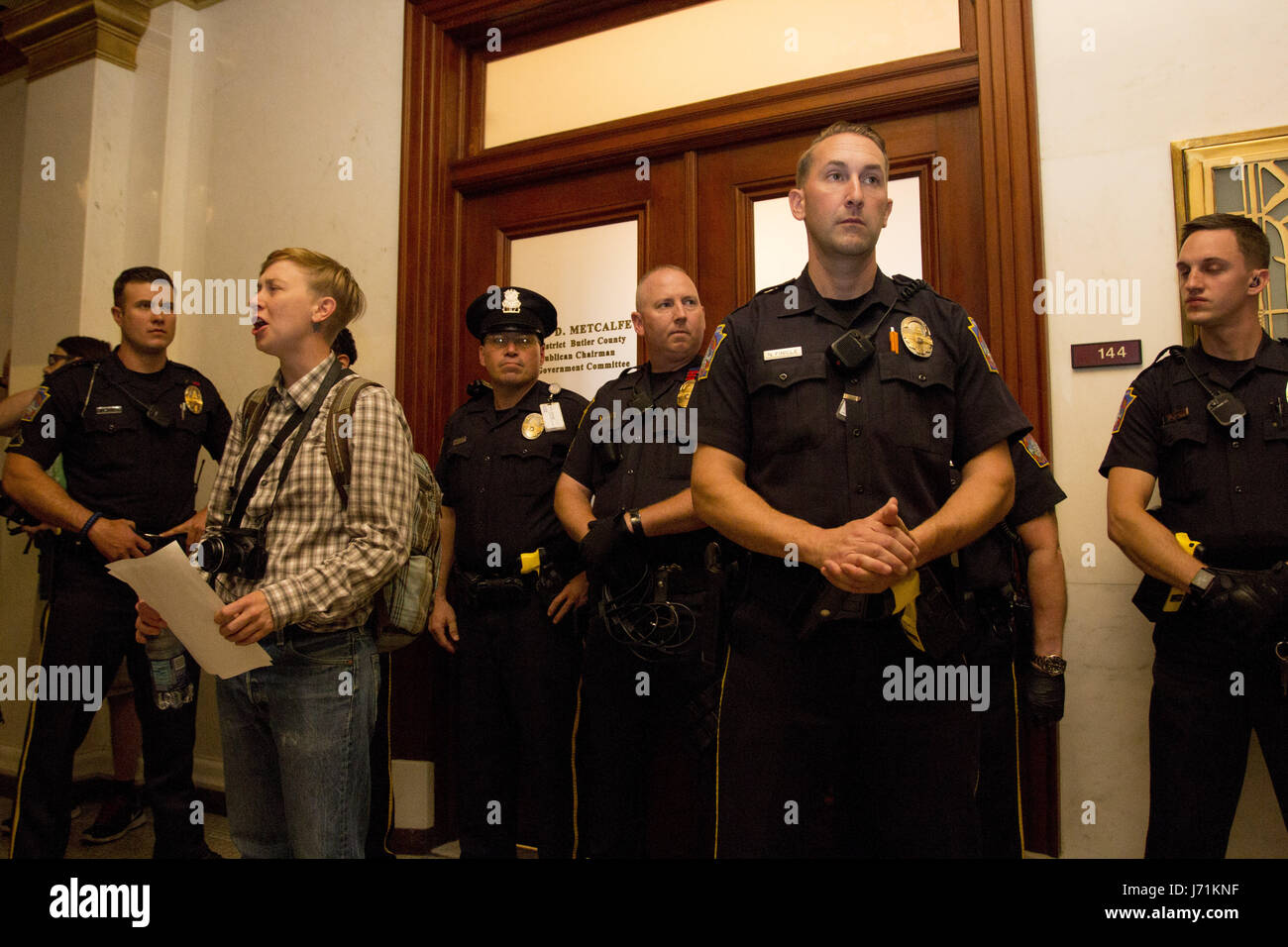 Harrisburg, USA. 22nd May, 2017. Police guard the office of PA State ...
