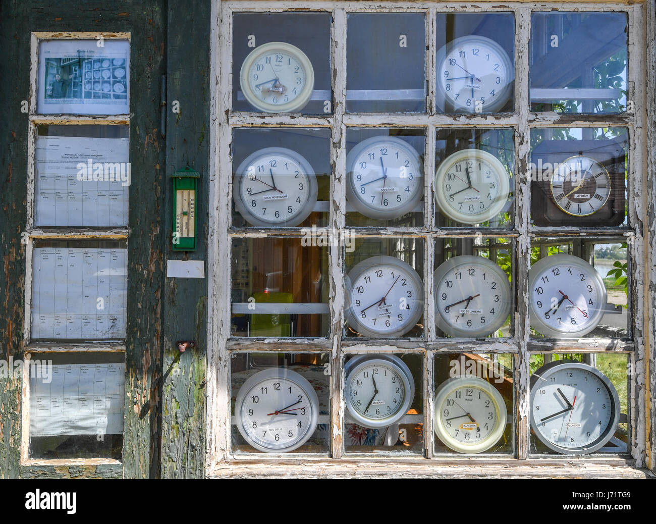 Clocks showing the time in different countries in the world can be seen ...