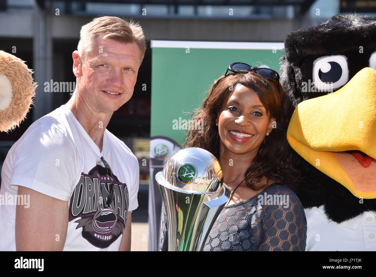Former boxer Torsten May and actress Liz Baffoe pose during the presentation of the fan and ...