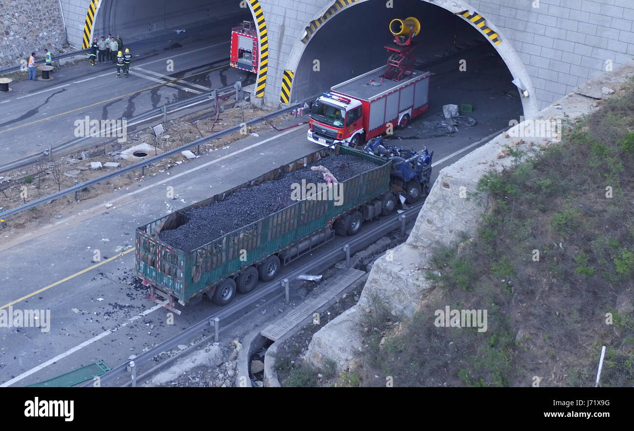 Shijiazhuang, China's Hebei Province. 23rd May, 2017. Rescuers clean ...