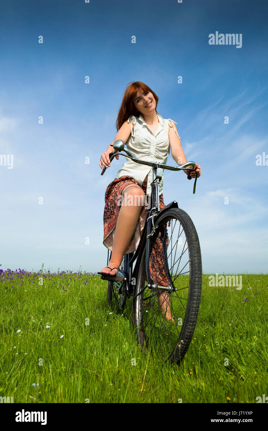 woman field spring bouncing bounces hop skipping frisks jumping jump ...
