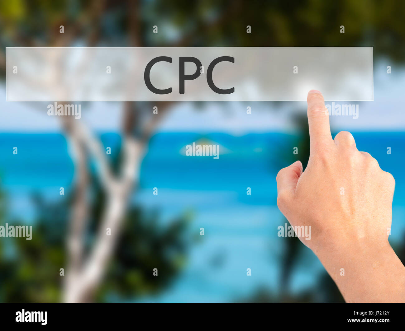 CPC - Hand pressing a button on blurred background concept . Business ...