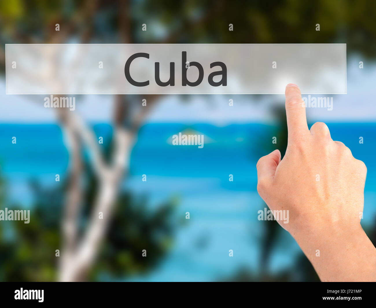 Cuba - Hand pressing a button on blurred background concept . Business ...