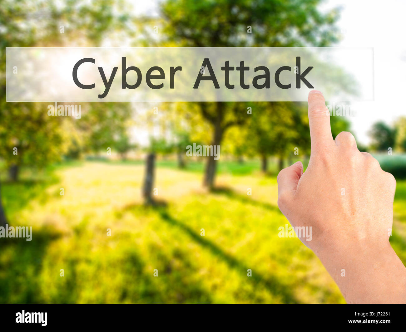 Cyber Attack - Hand pressing a button on blurred background concept ...