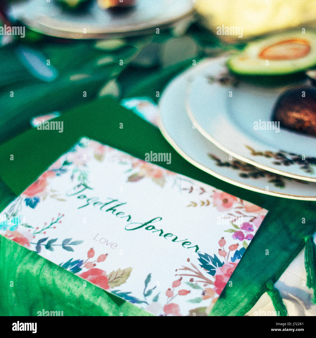beautiful wedding invitation on Table setting Stock Photo - Alamy