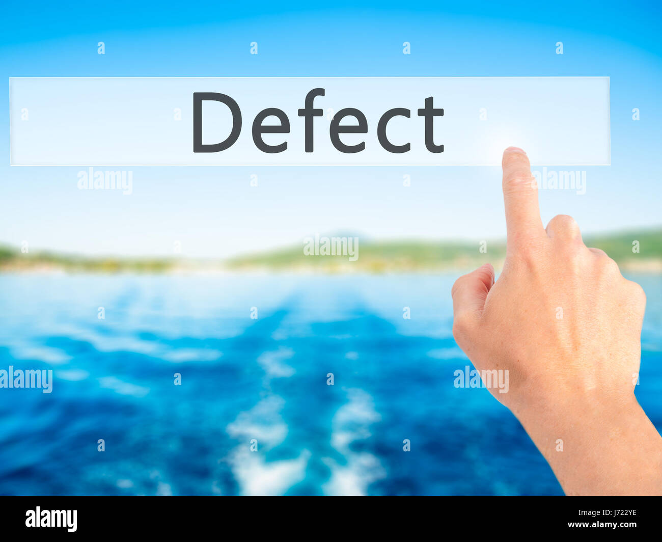 Defect - Hand pressing a button on blurred background concept ...