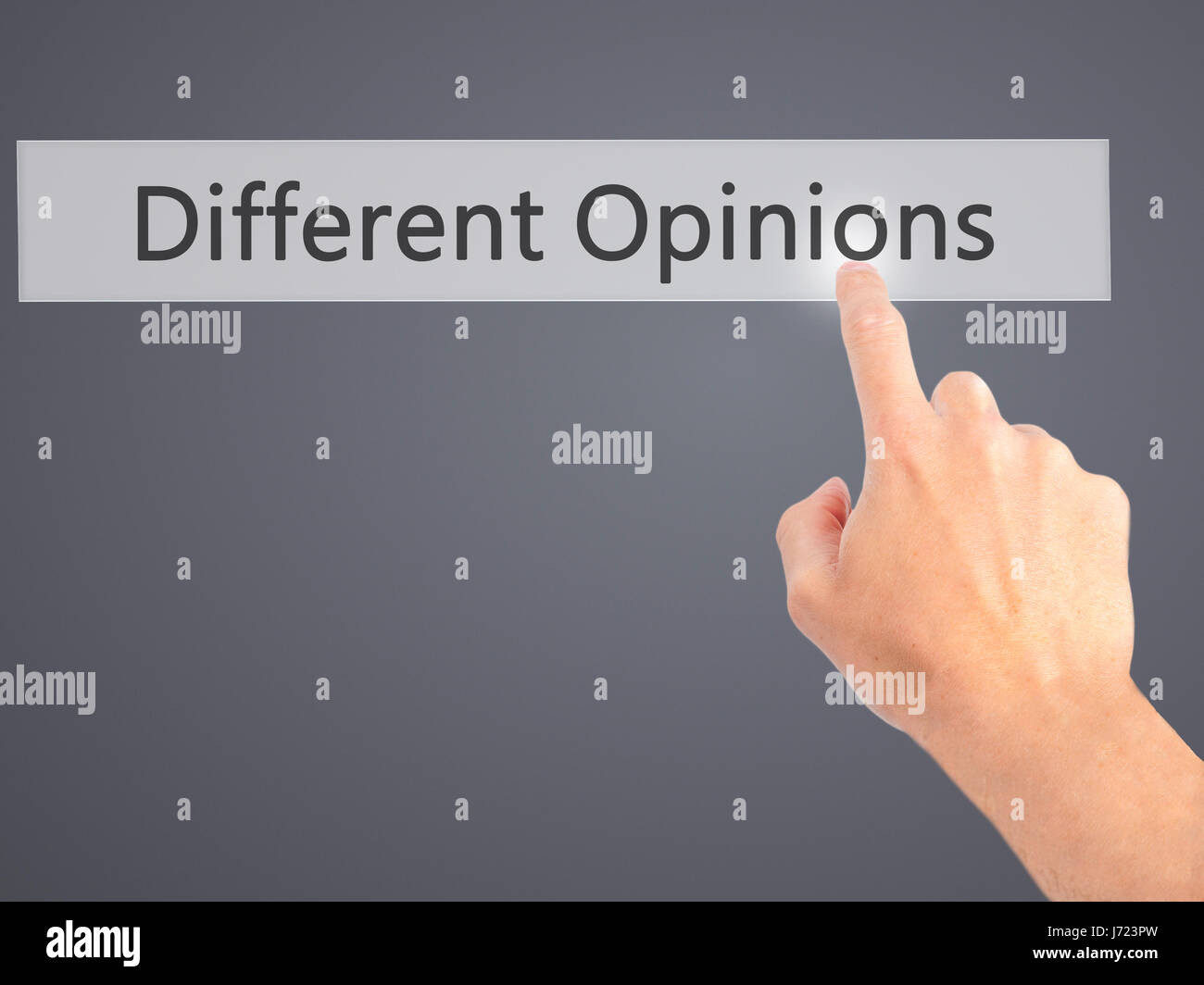 Different Opinions - Hand pressing a button on blurred background ...