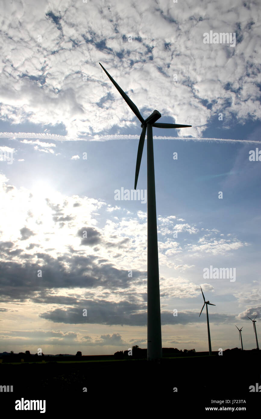 wind wheels in the backlight Stock Photo - Alamy