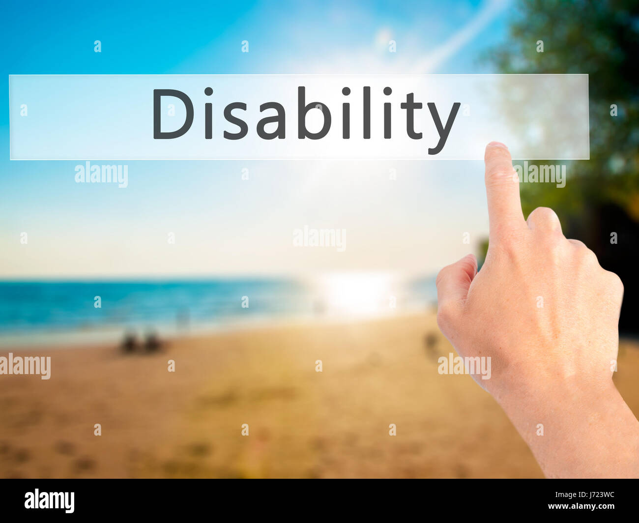 Disability - Hand pressing a button on blurred background concept ...