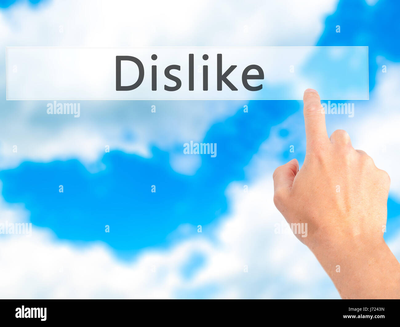 Dislike - Hand pressing a button on blurred background concept ...