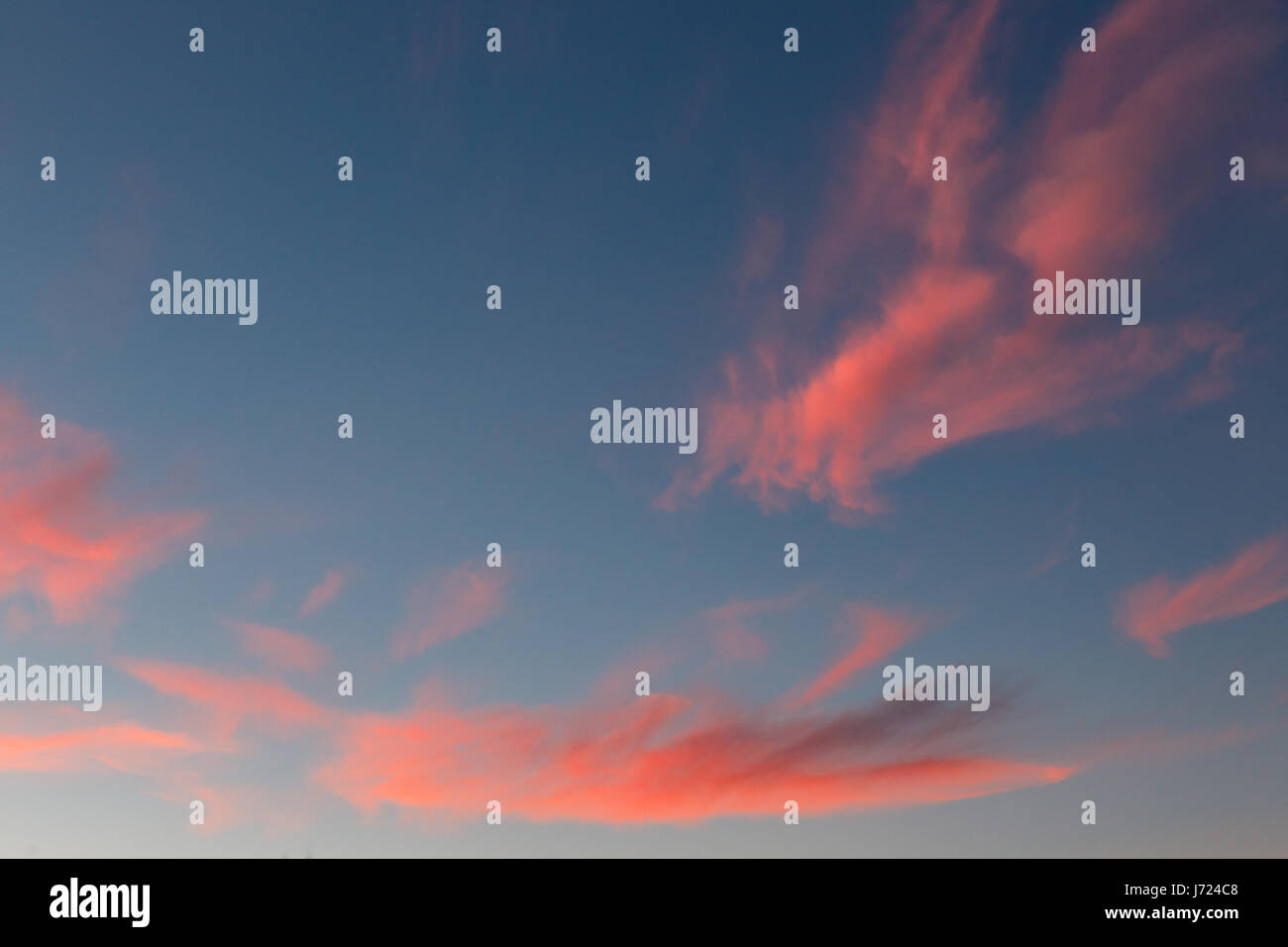 Beautiful red sunset clouds sky at dusk Stock Photo - Alamy