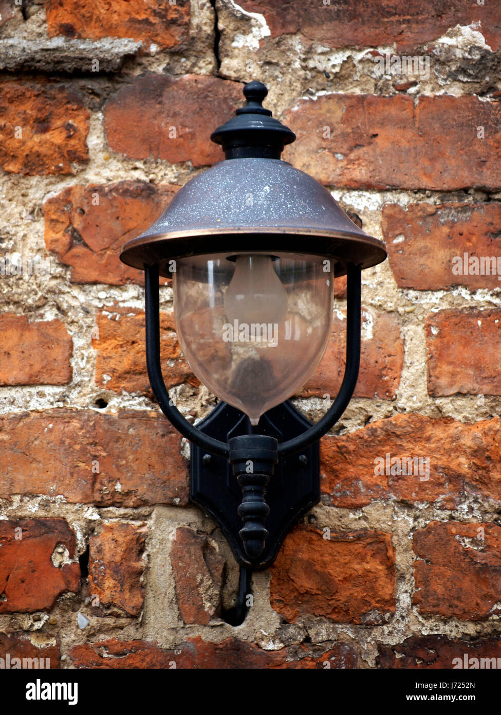 lamp on brick wall Stock Photo - Alamy