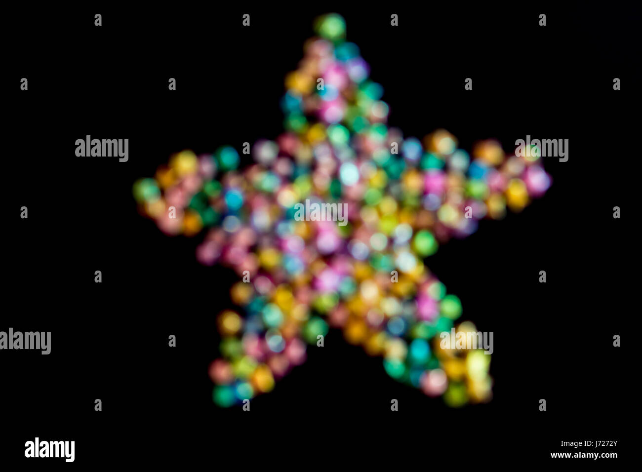 colorful star bokeh black background Stock Photo - Alamy