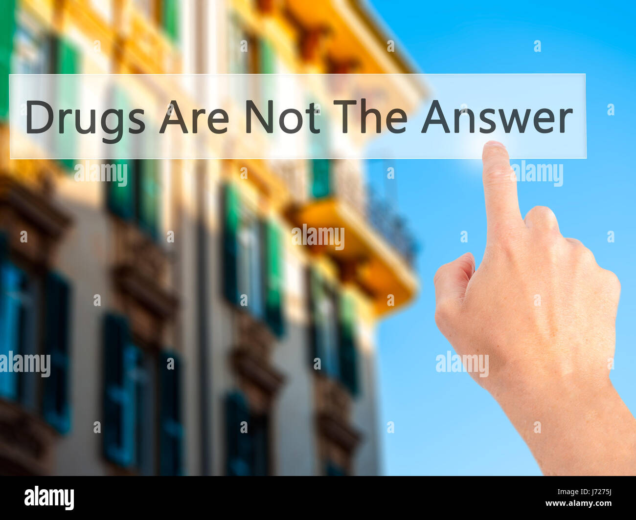 Drugs Are Not The Answer - Hand pressing a button on blurred background ...