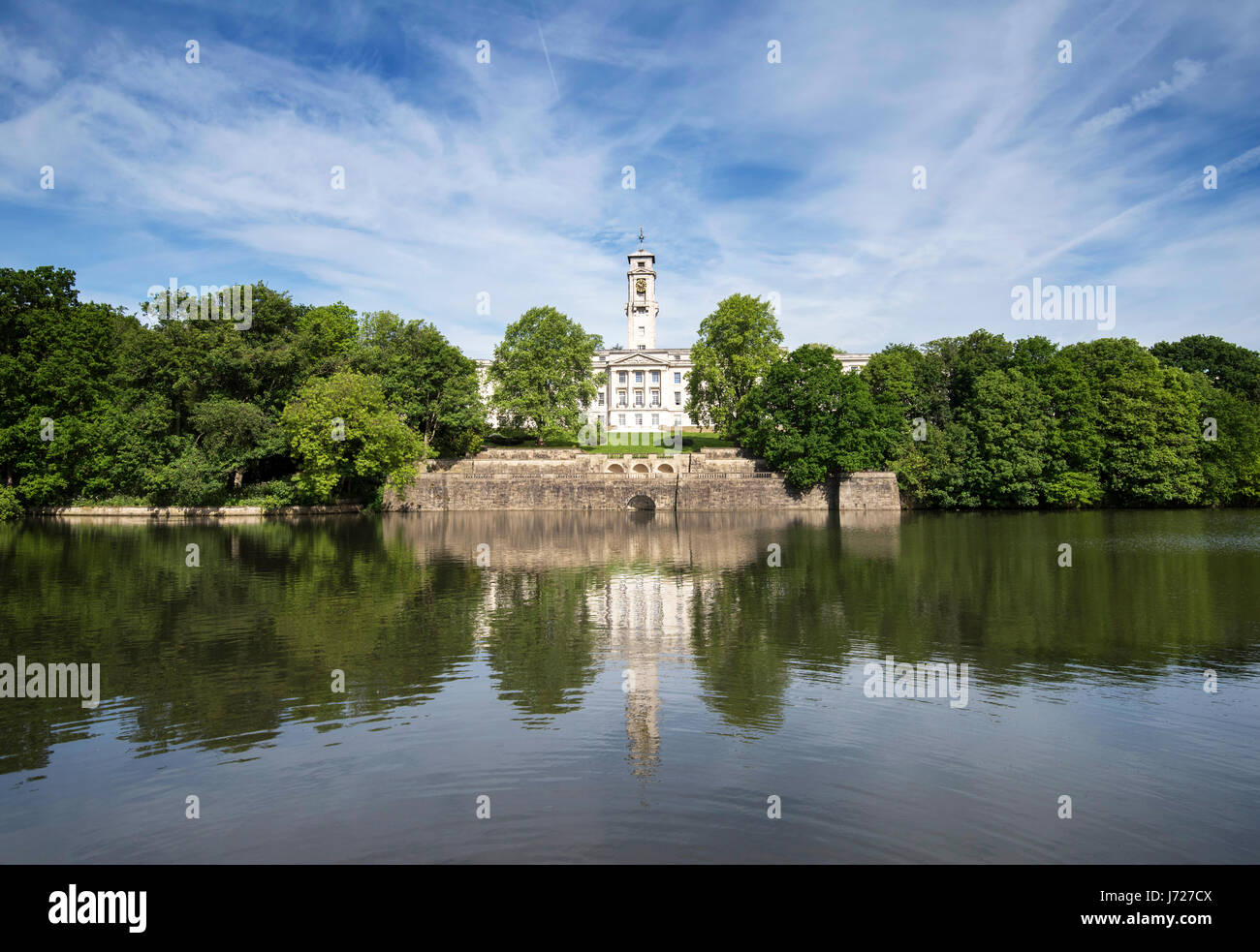 Trent Building reflected in the boating lake at Highfields University ...