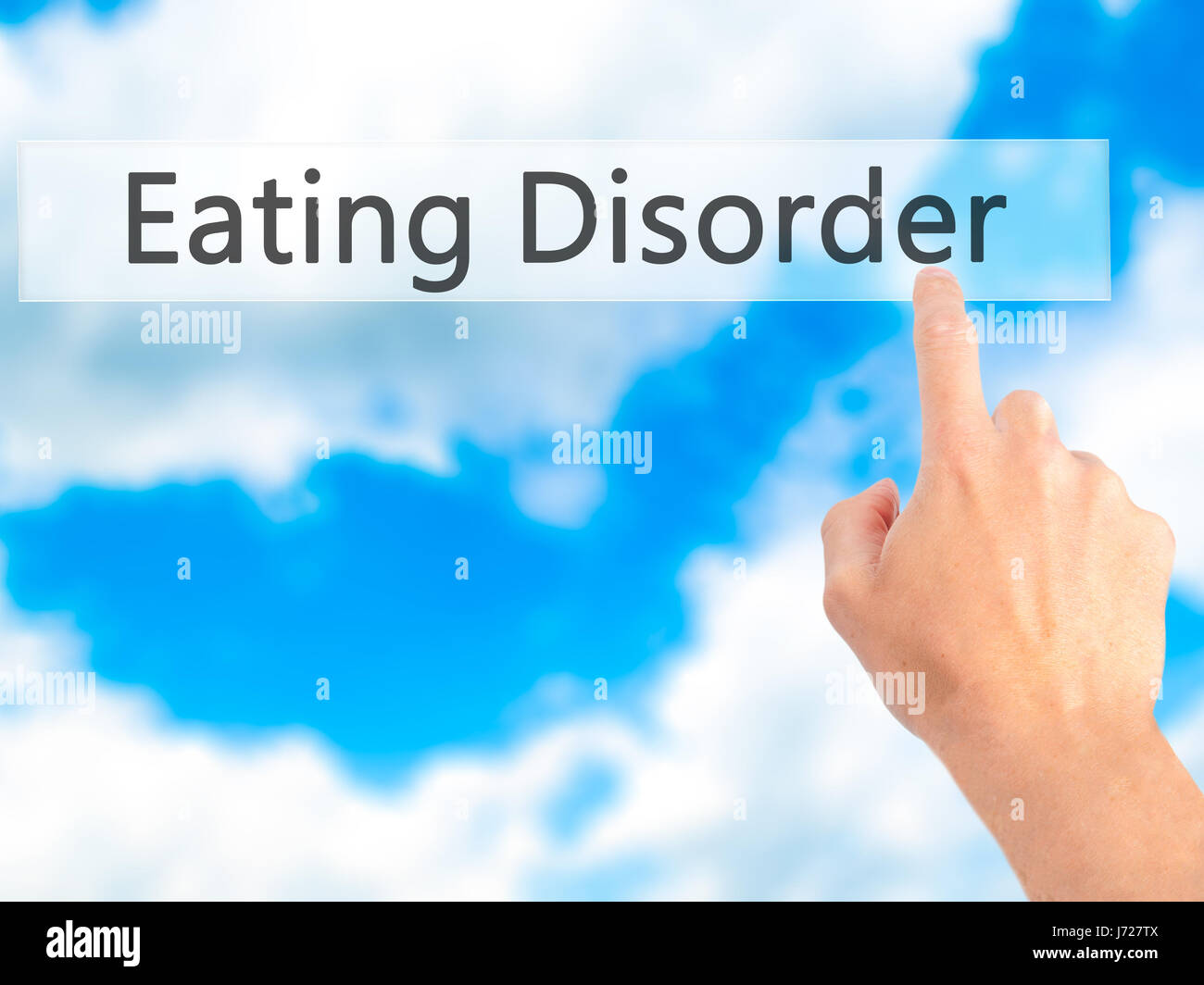 Eating Disorder - Hand pressing a button on blurred background concept ...